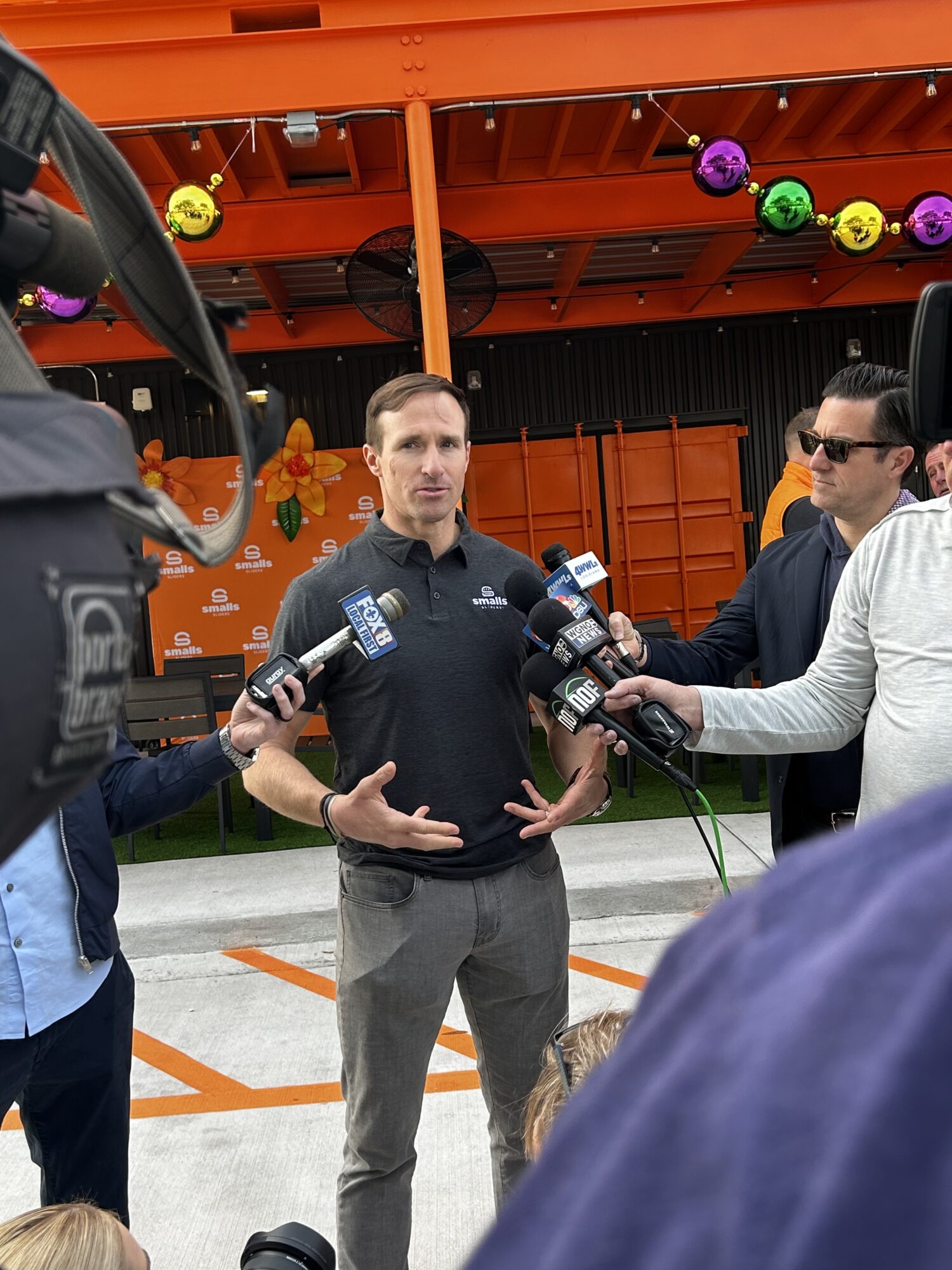 Drew Brees Cuts Ribbon, Smalls Sliders Opens in Metairie